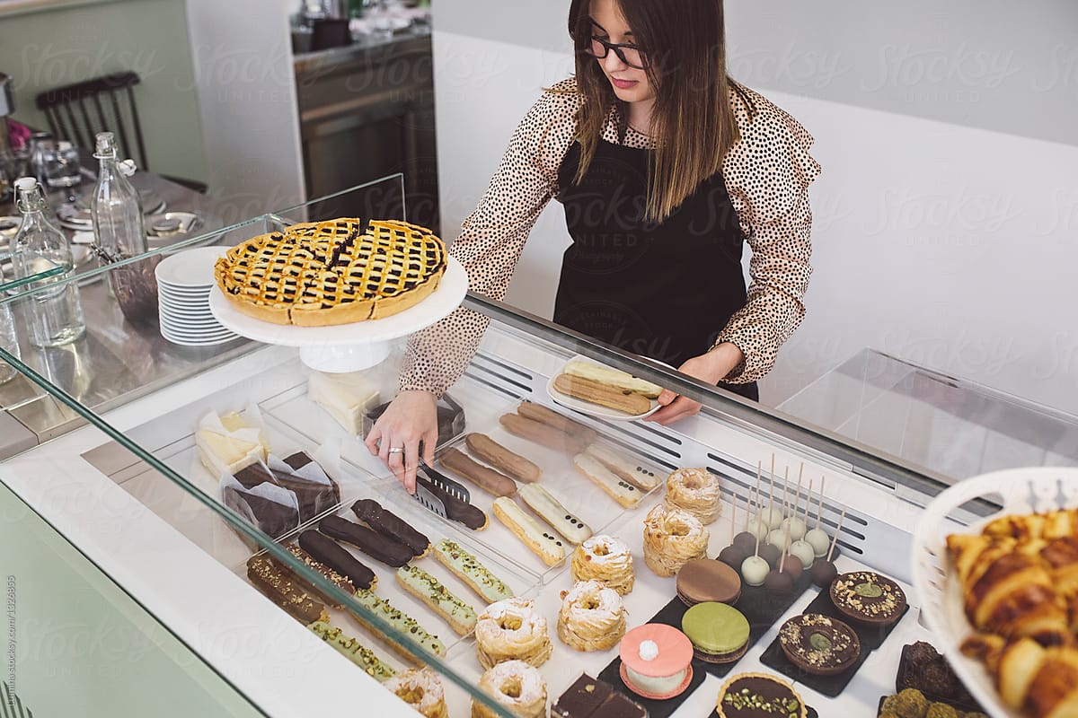 "Woman Working At Bakery" by Stocksy Contributor "Lumina" - Stocksy