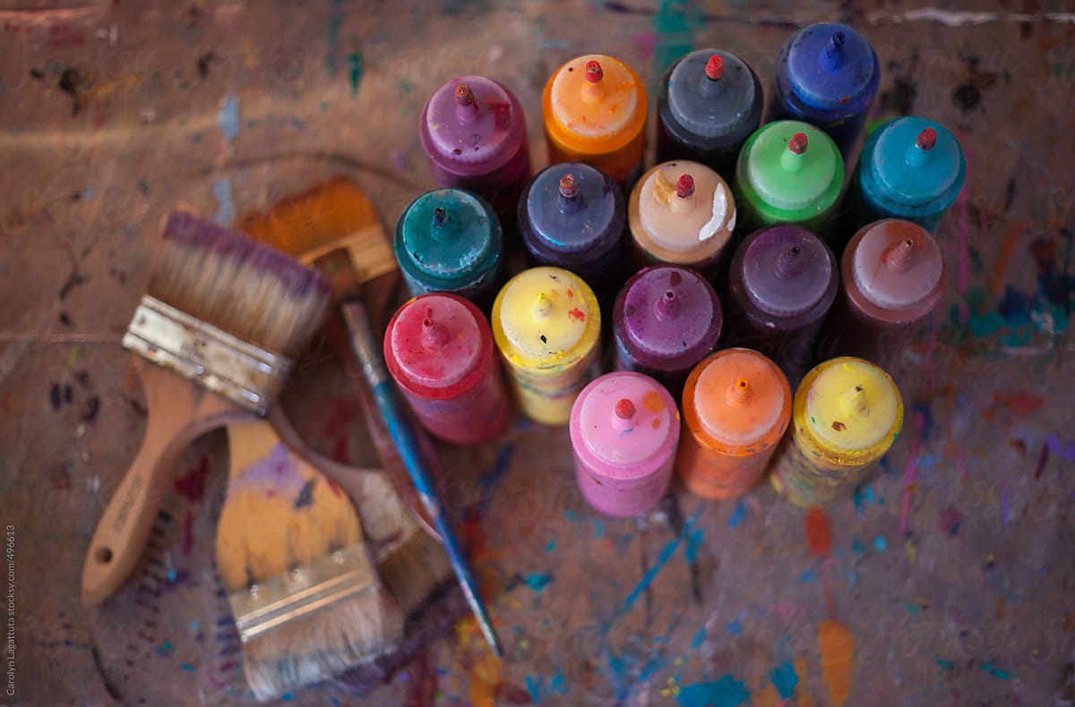 "Overhead Shot Of Many Bottles Of Paint And Brushes" by Stocksy ...