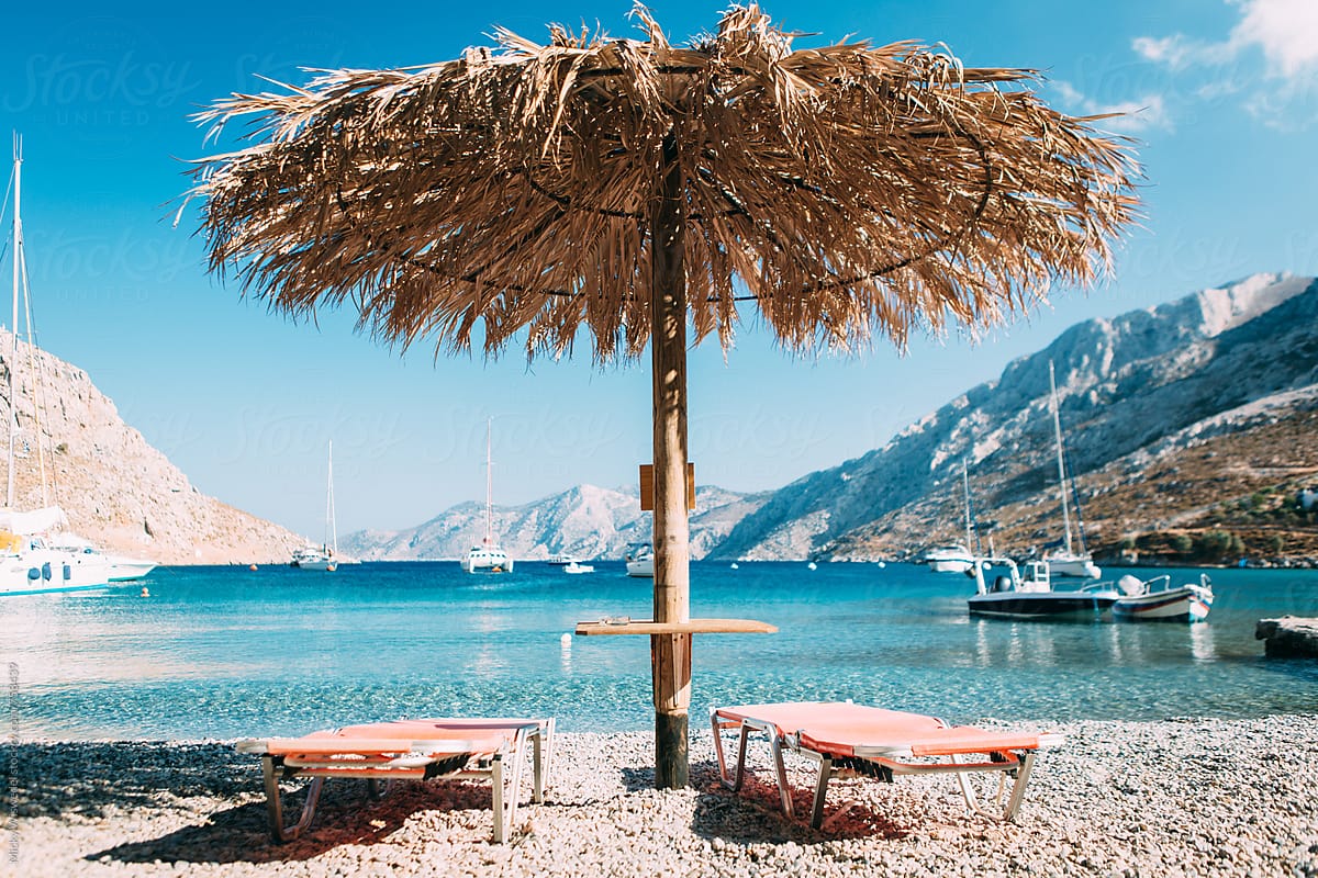 "Beach Vacation Scene" by Stocksy Contributor "Juno" - Stocksy