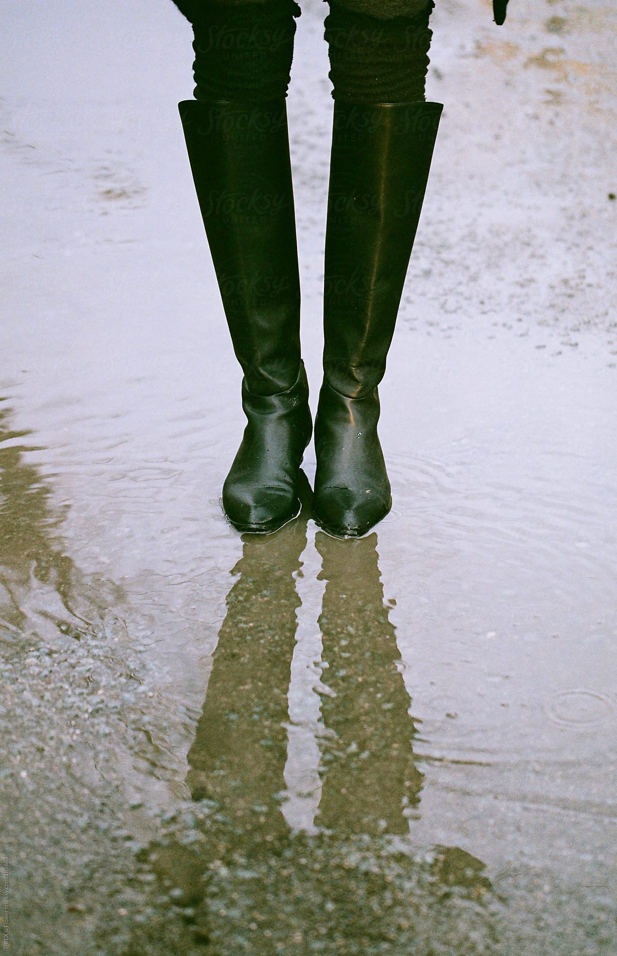 "Woman Standing In A Puddle" by Stocksy Contributor "Danil Nevsky ...