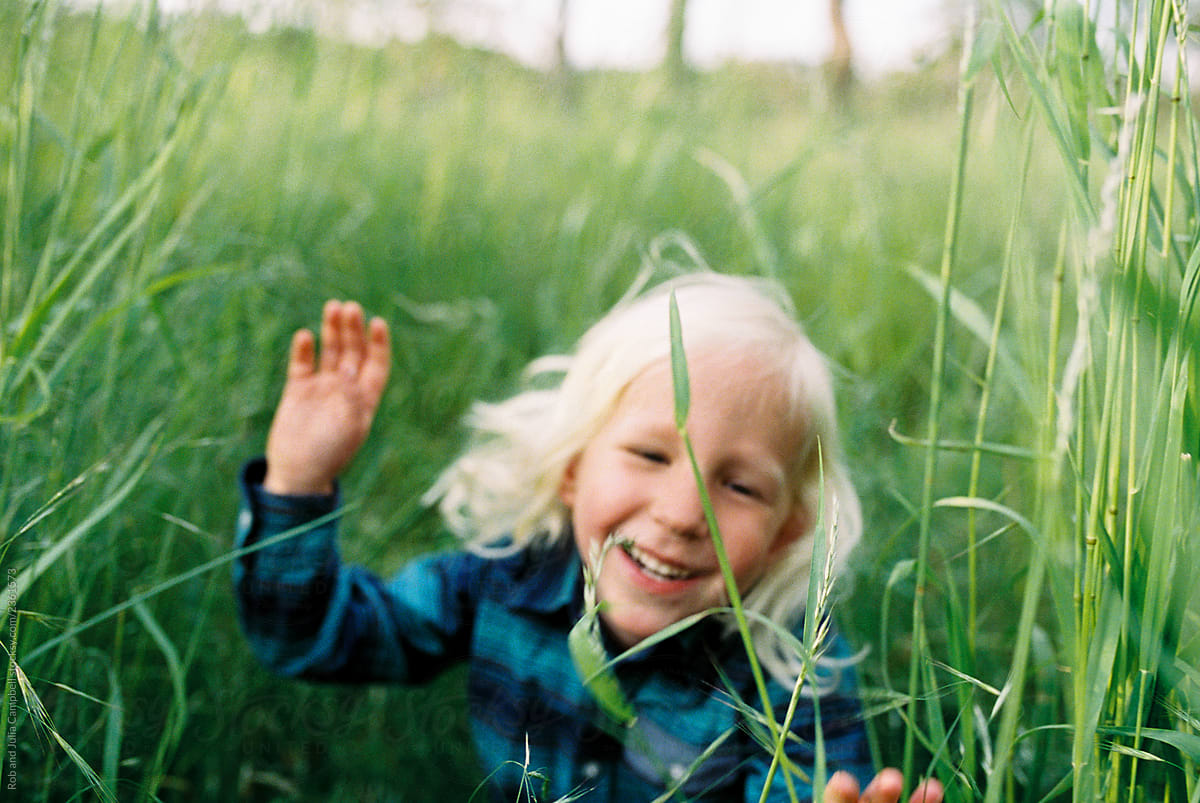 "Boy Outside In Nature" by Stocksy Contributor "Rob And Julia Campbell ...