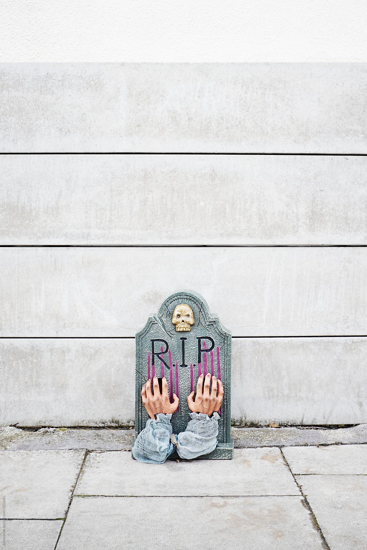 "Fake Tombstone On A Pavement" by Stocksy Contributor "James Ross ...