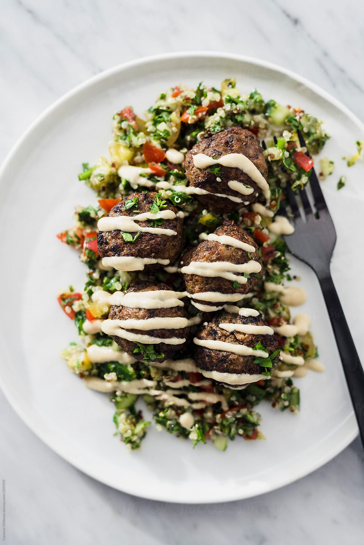 "Lebanese Kofta Spiced Meatballs With Quinoa Tabouleh" by Stocksy ...