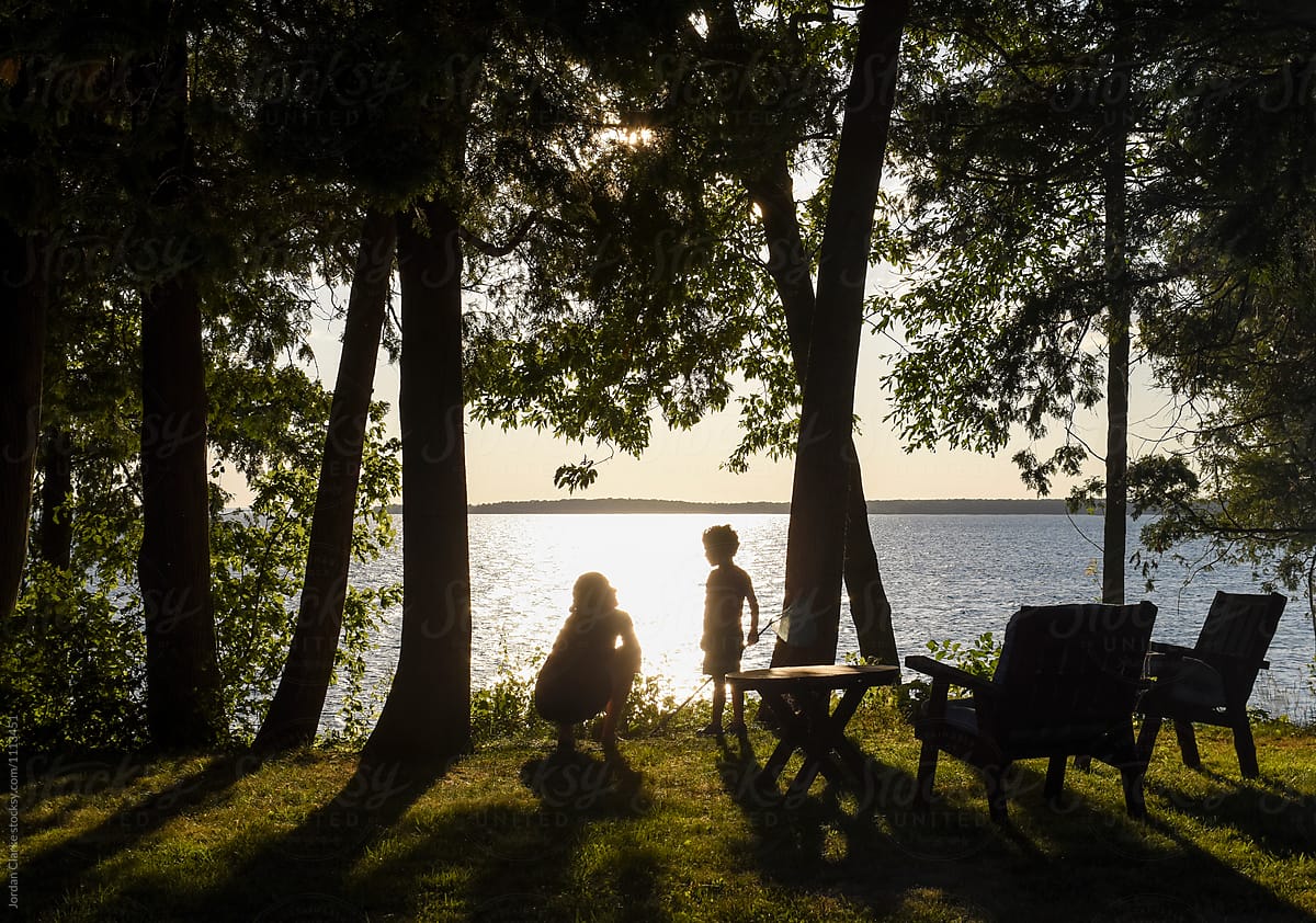 "Fun At The Lake" by Stocksy Contributor "Jordan Clarke" - Stocksy