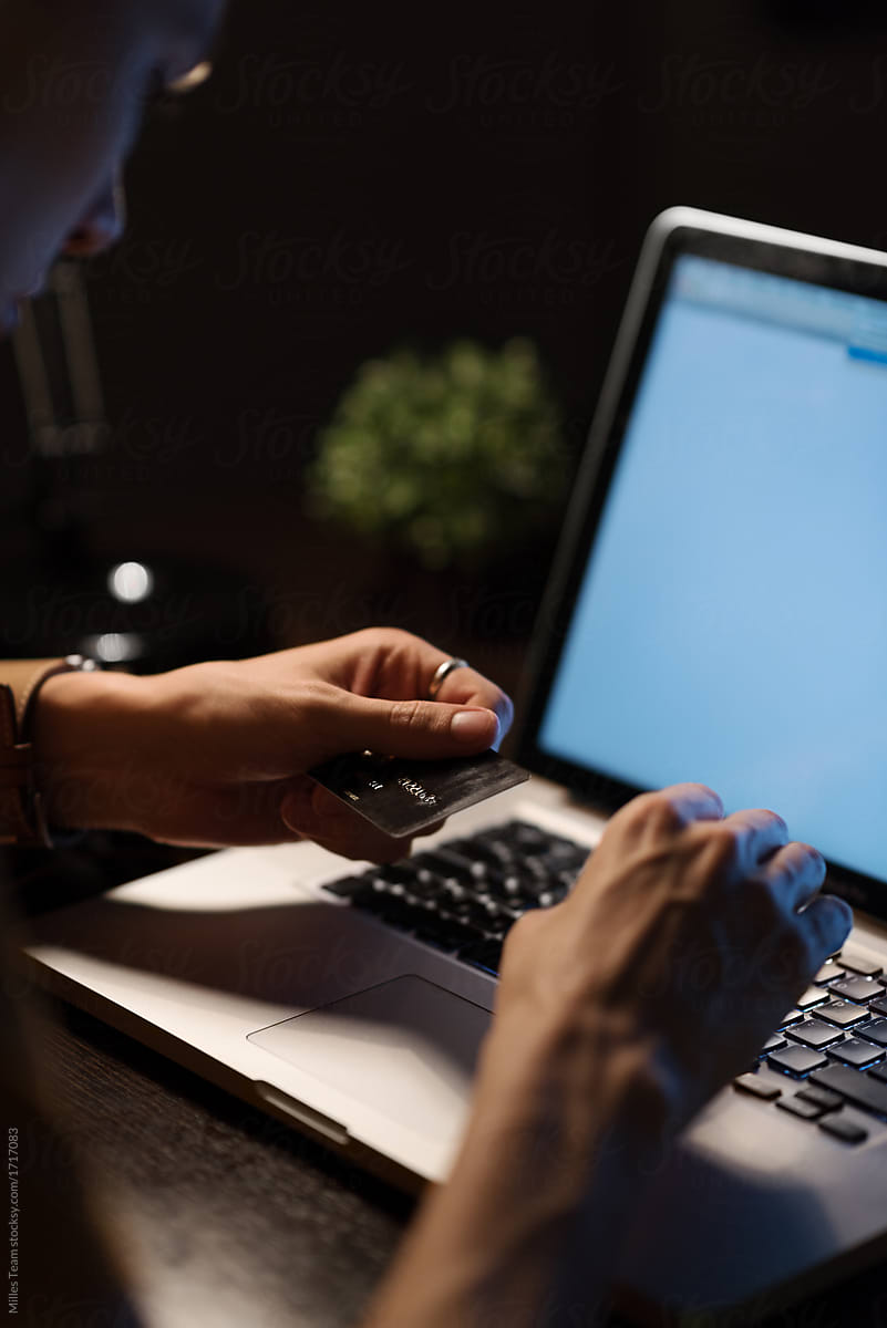 "Person Using Card For Online Payment" by Stocksy Contributor "Milles ...