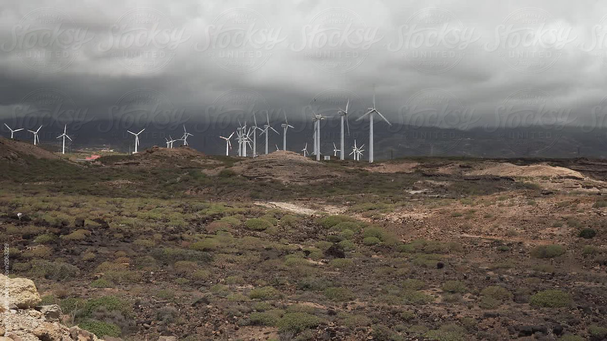 "Dramatic Landscape With Wind Turbines" by Stocksy Contributor "B ...