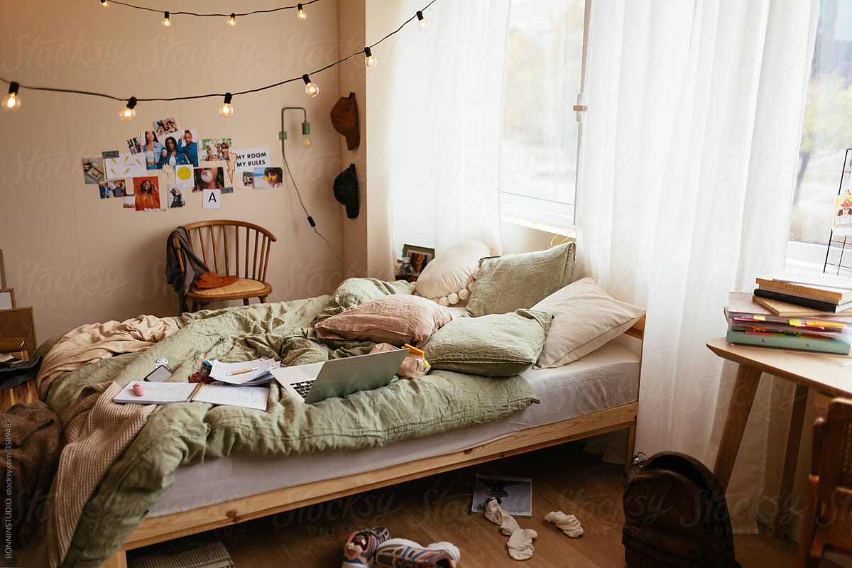 Cozy Bedroom Of Teenager With Messy Bed By Stocksy Contributor Cozy Bedroom Of Teenager With Messy Bed By Stocksy Contributor