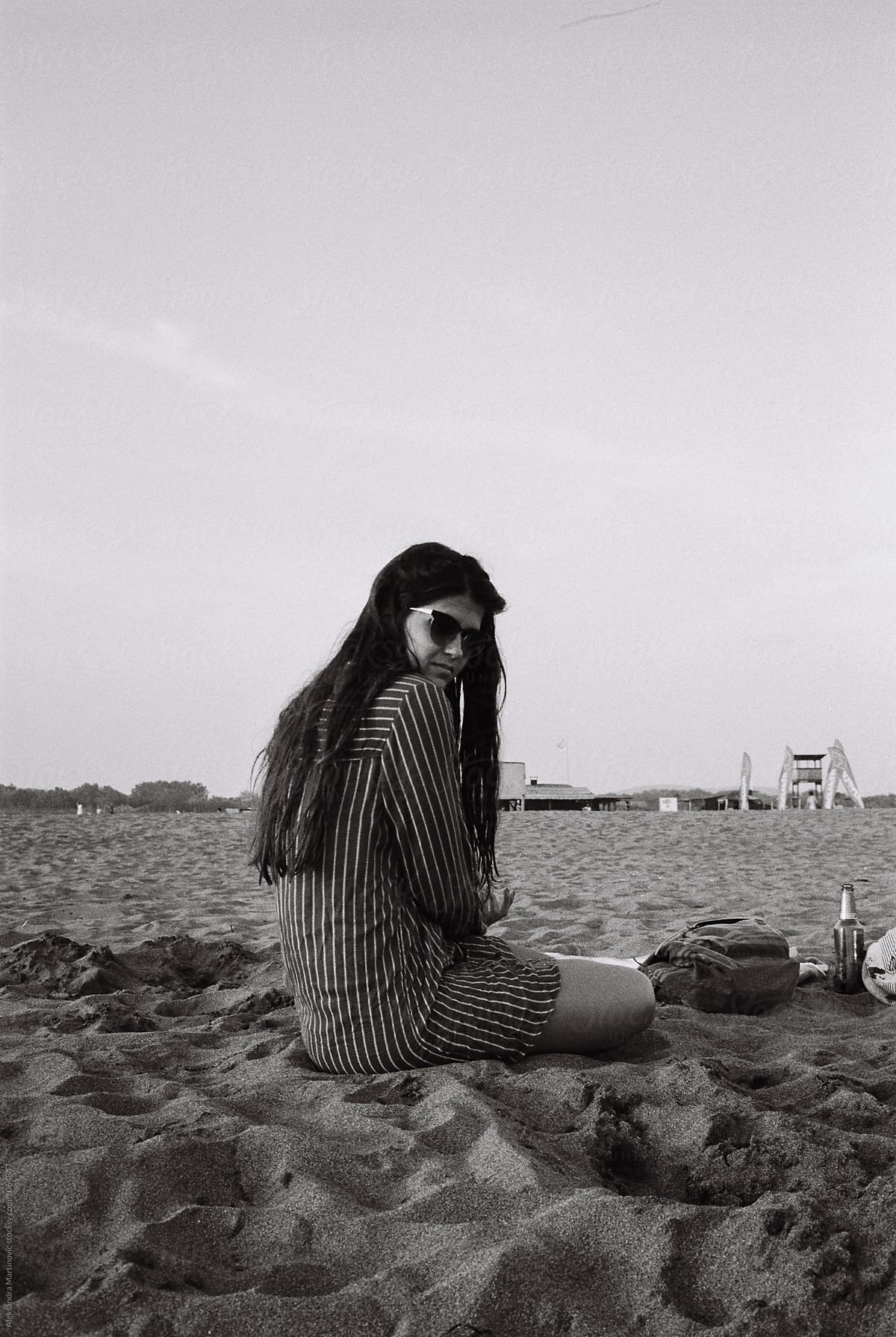 "On The Sandy Beach" by Stocksy Contributor "Aleksandra Martinovic ...