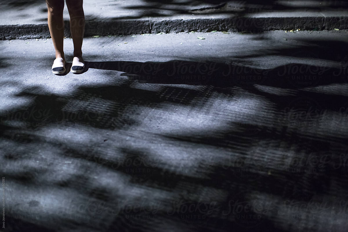 "Woman's Feet At Night" by Stocksy Contributor "Jovo Jovanovic" - Stocksy