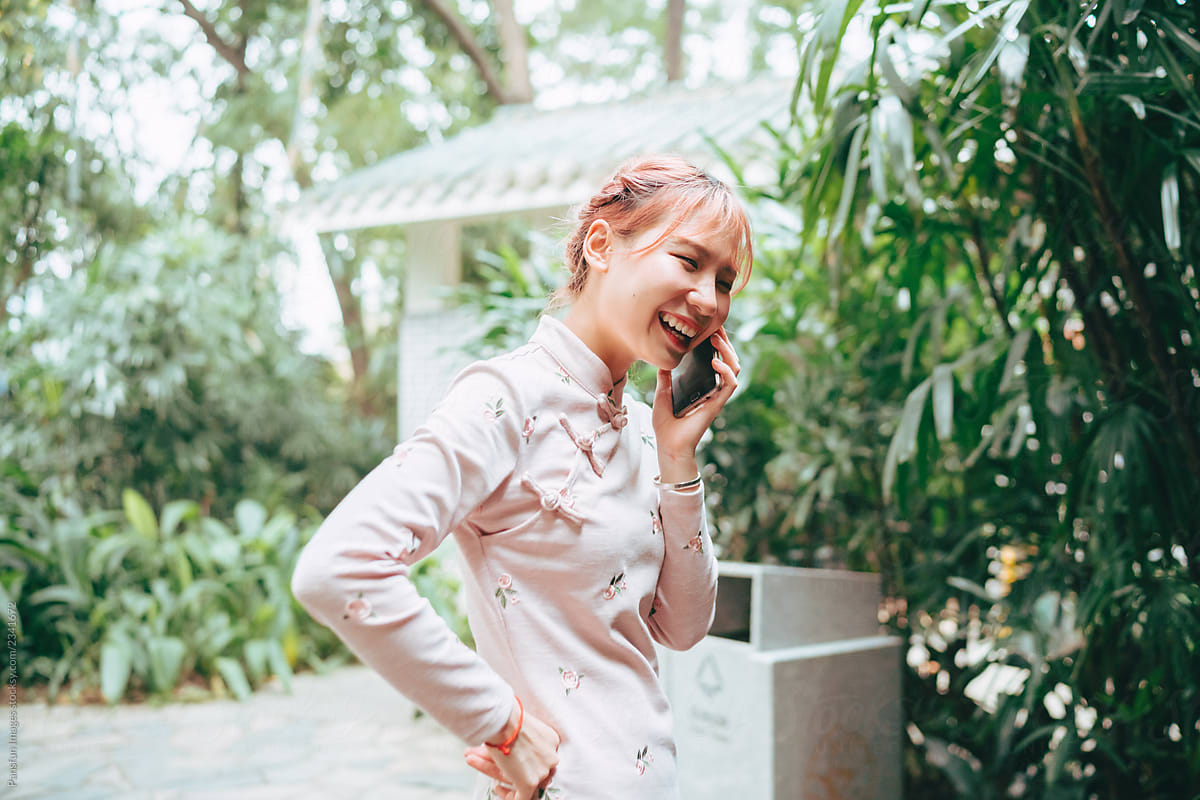 "A Chinese Woman Is Using Cell Phone" by Stocksy Contributor "Pansfun ...