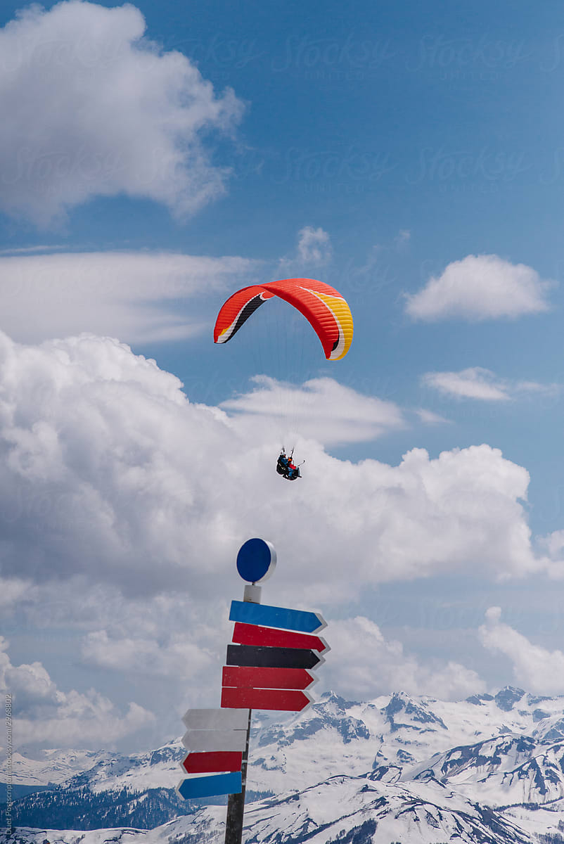 "Paraglider Flies Over The Mountains. Paraglider In The Sky." by ...