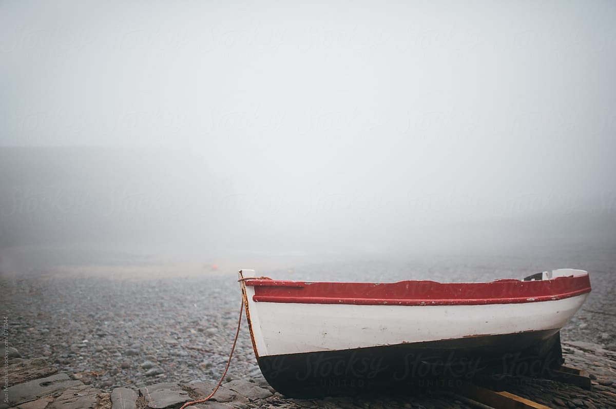 "Boat On A Quay In Fog" by Stocksy Contributor "Suzi Marshall" - Stocksy