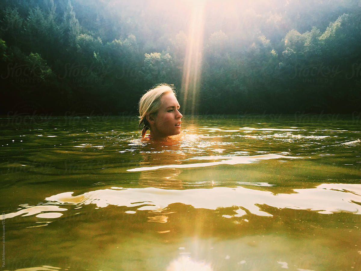 "Early Morning Swim" by Stocksy Contributor "Paul Schlemmer" - Stocksy
