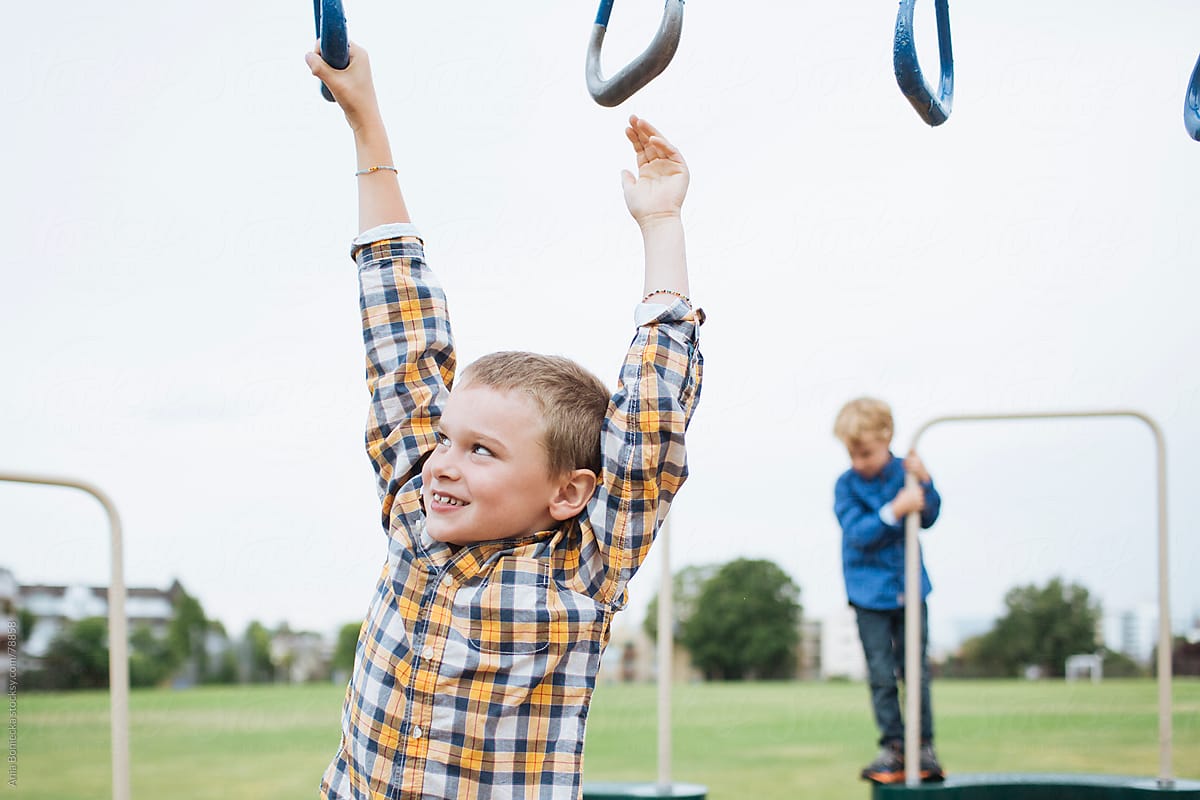 "Boys Playing In The Park" by Stocksy Contributor "A Model Photographer ...