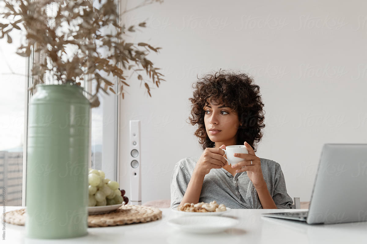 "Woman Relaxing With Hot Beverage In Morning" by Stocksy Contributor ...
