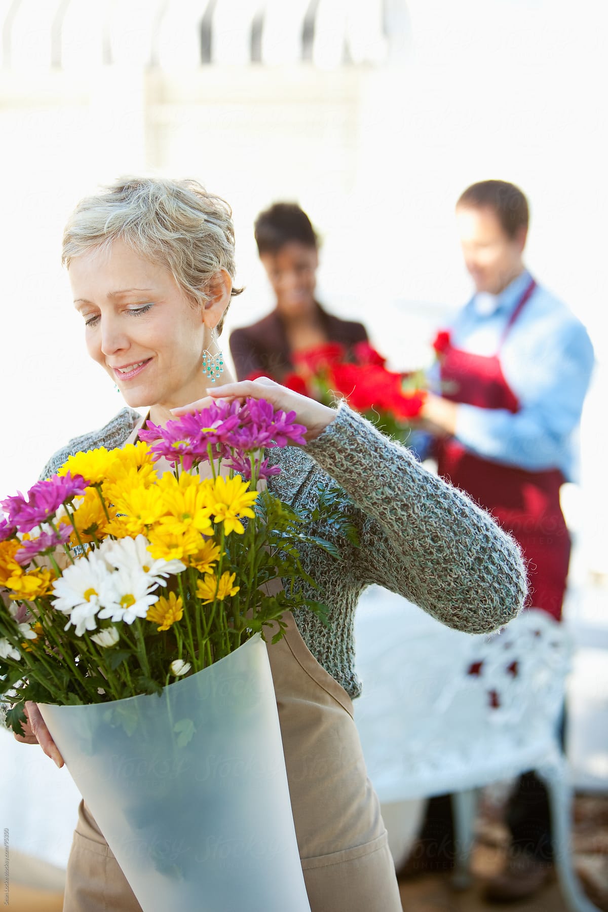 "Shop: Looking At Flowers" by Stocksy Contributor "Sean Locke" - Stocksy