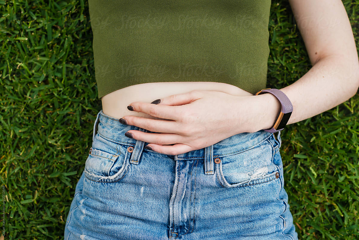 "Midriff Of Young Woman" by Stocksy Contributor "Gillian Vann" - Stocksy
