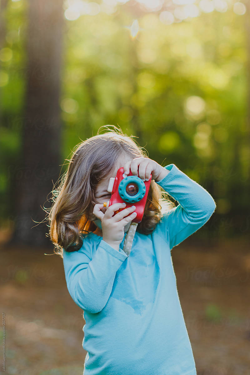 "Toddler Having Fun With A Toy Camera" by Stocksy Contributor "Jakob ...