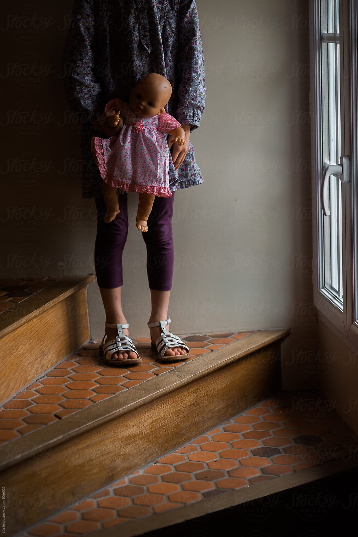 "Little Girl Holding Doll In Hands" by Stocksy Contributor "Lea Jones ...