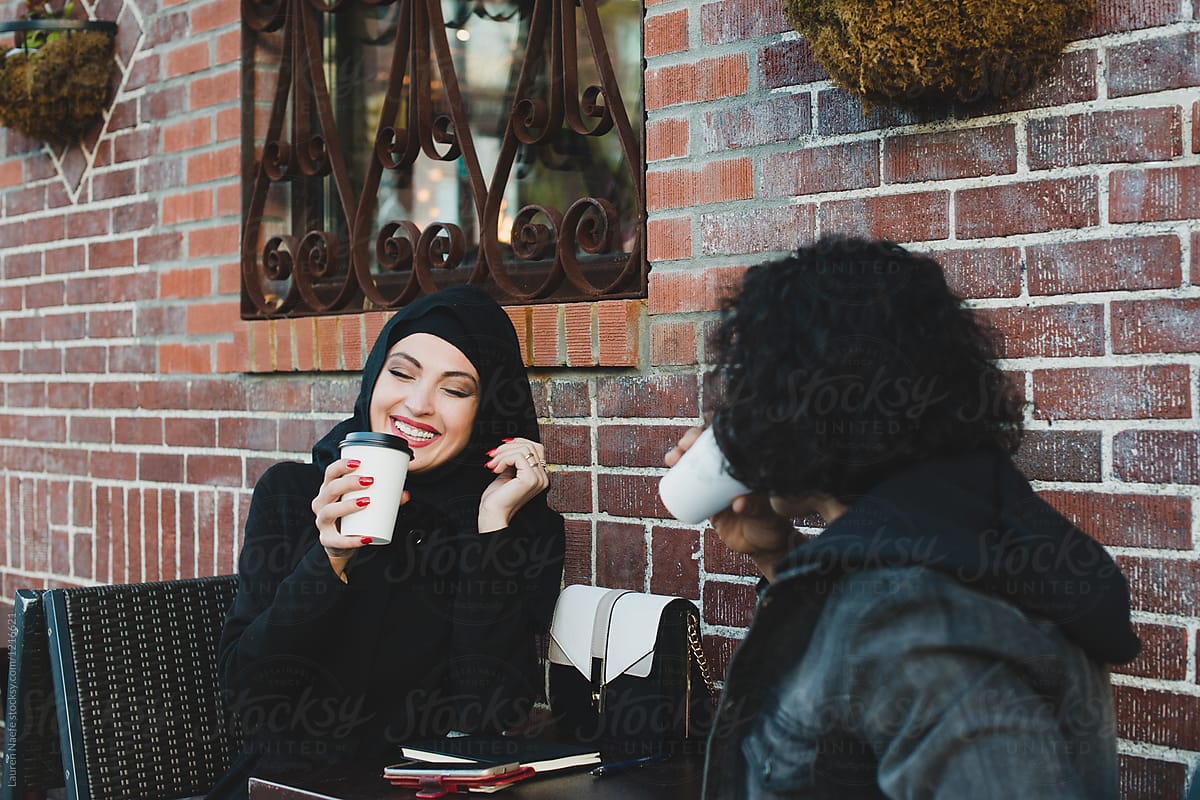 "Young Muslim Couple Drinking Coffee" by Stocksy Contributor "Lauren ...