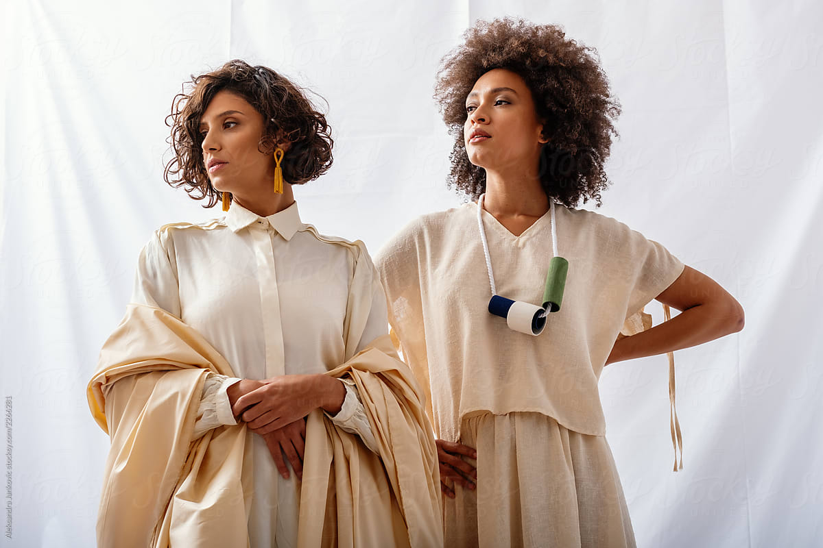 "Female Models Wearing White Cotton And Silk Dresses In The Studio" by ...