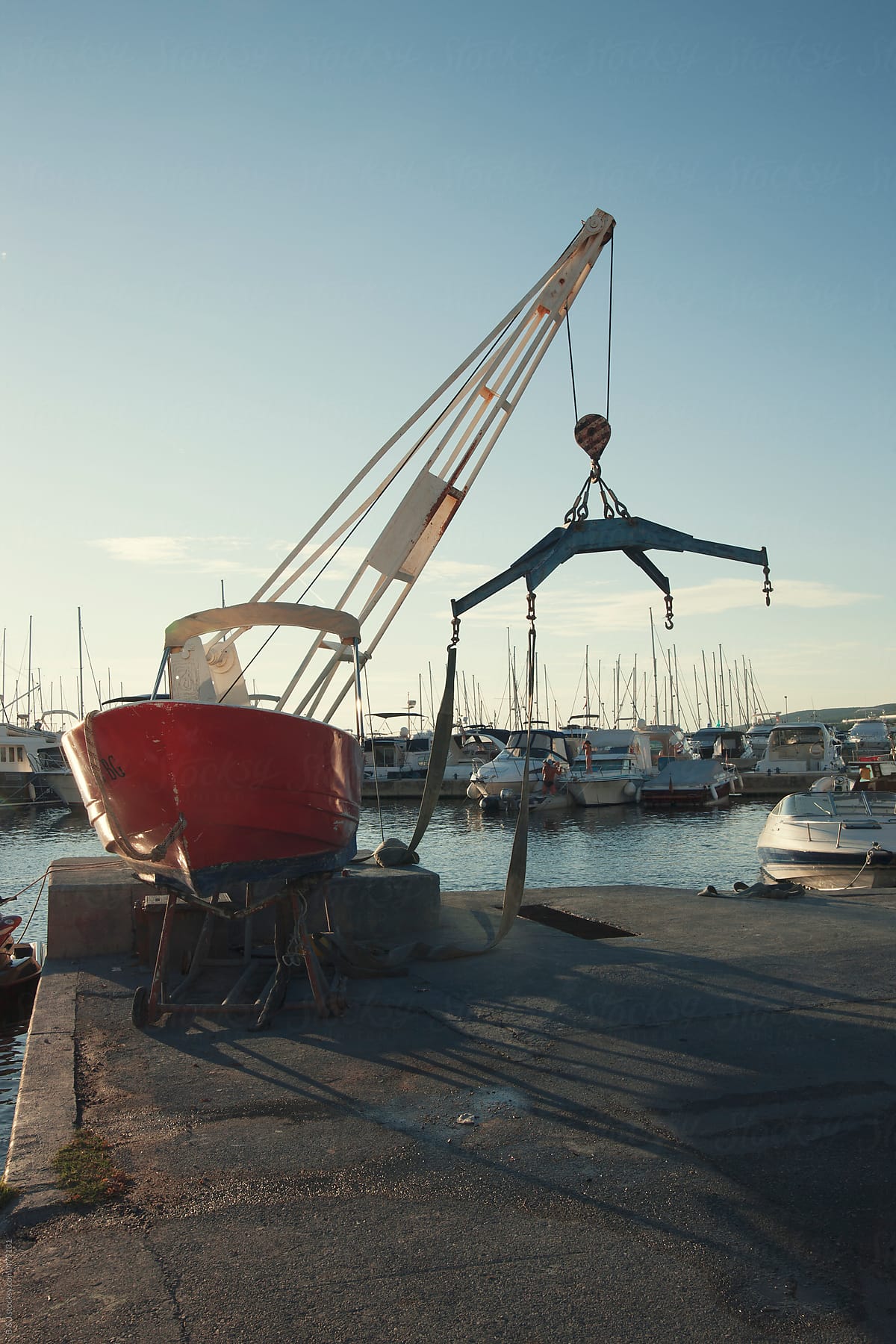 "Crane On Boat Yard" by Stocksy Contributor "B & J" - Stocksy