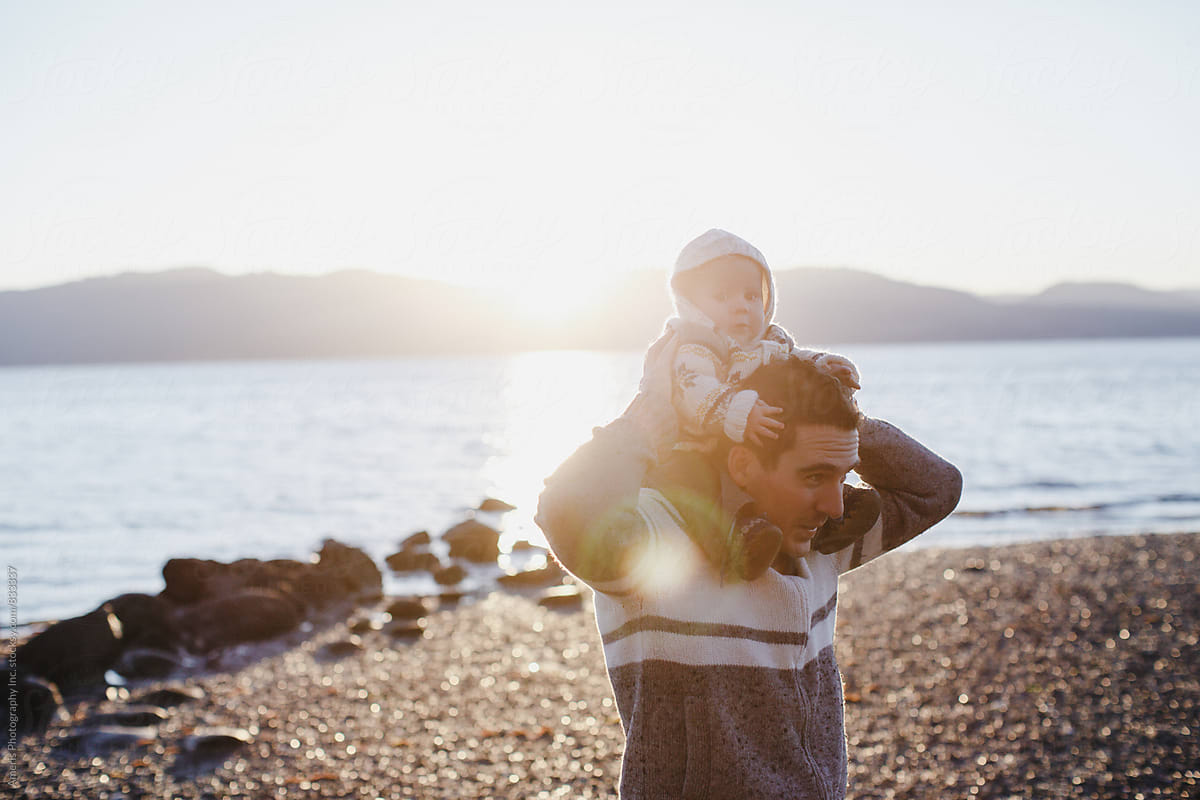 "Young Dad Giving Baby Boy A Shoulder Ride At Sunset" by Stocksy ...