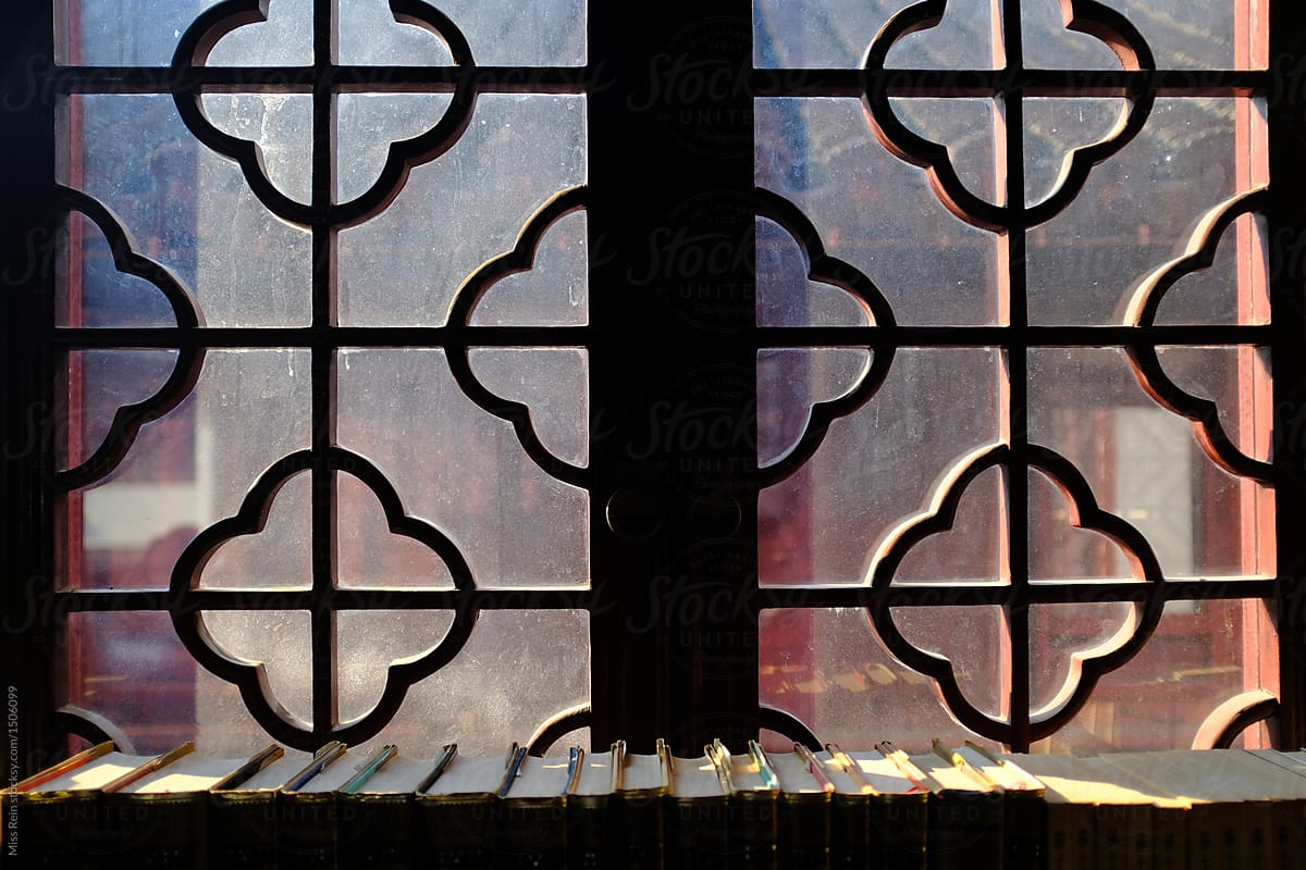 "View Of Chinese Windows And Books" by Stocksy Contributor "Rein Cheng ...