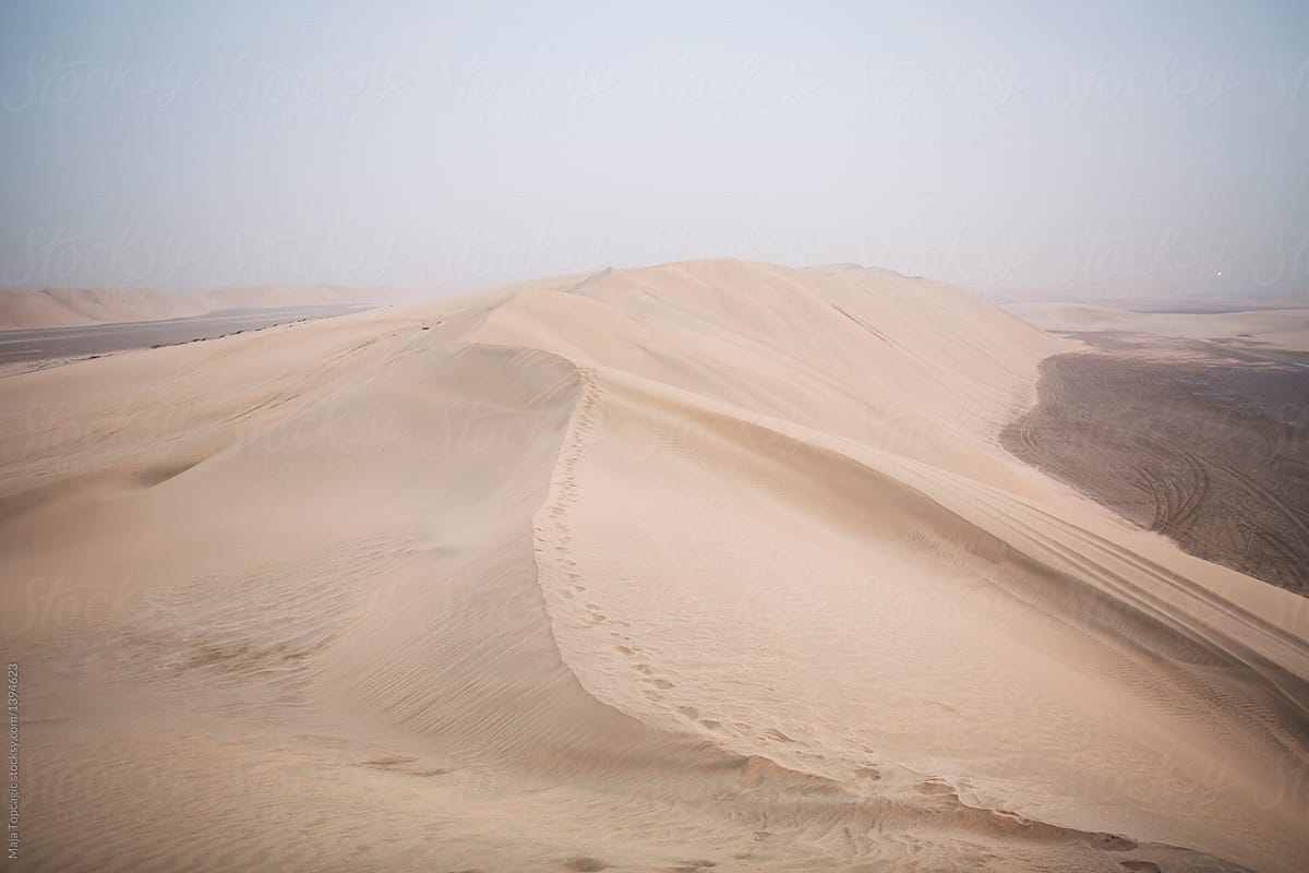 "Footprints In The Sand" by Stocksy Contributor "Maja Topcagic" - Stocksy