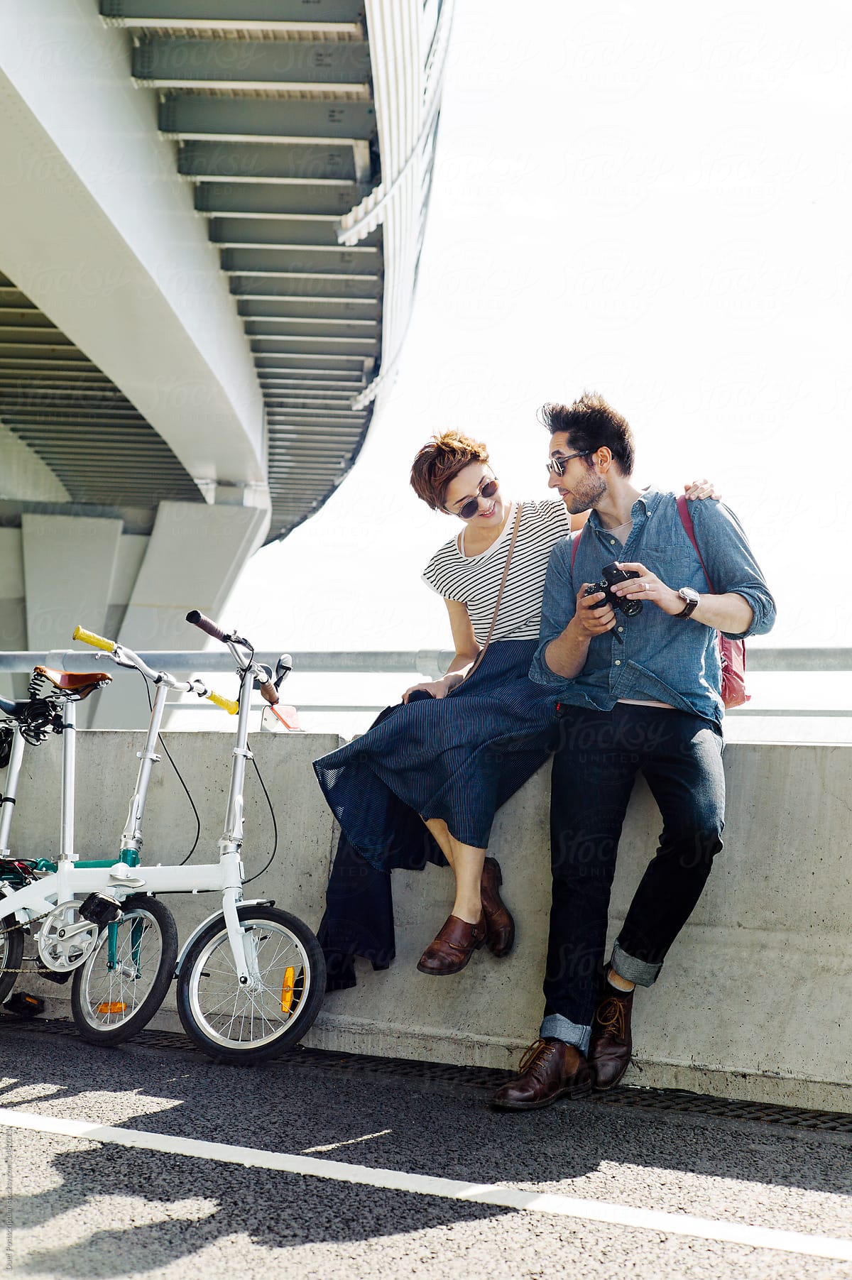 "Couple Watching Photos At Camera" by Stocksy Contributor "Duet ...
