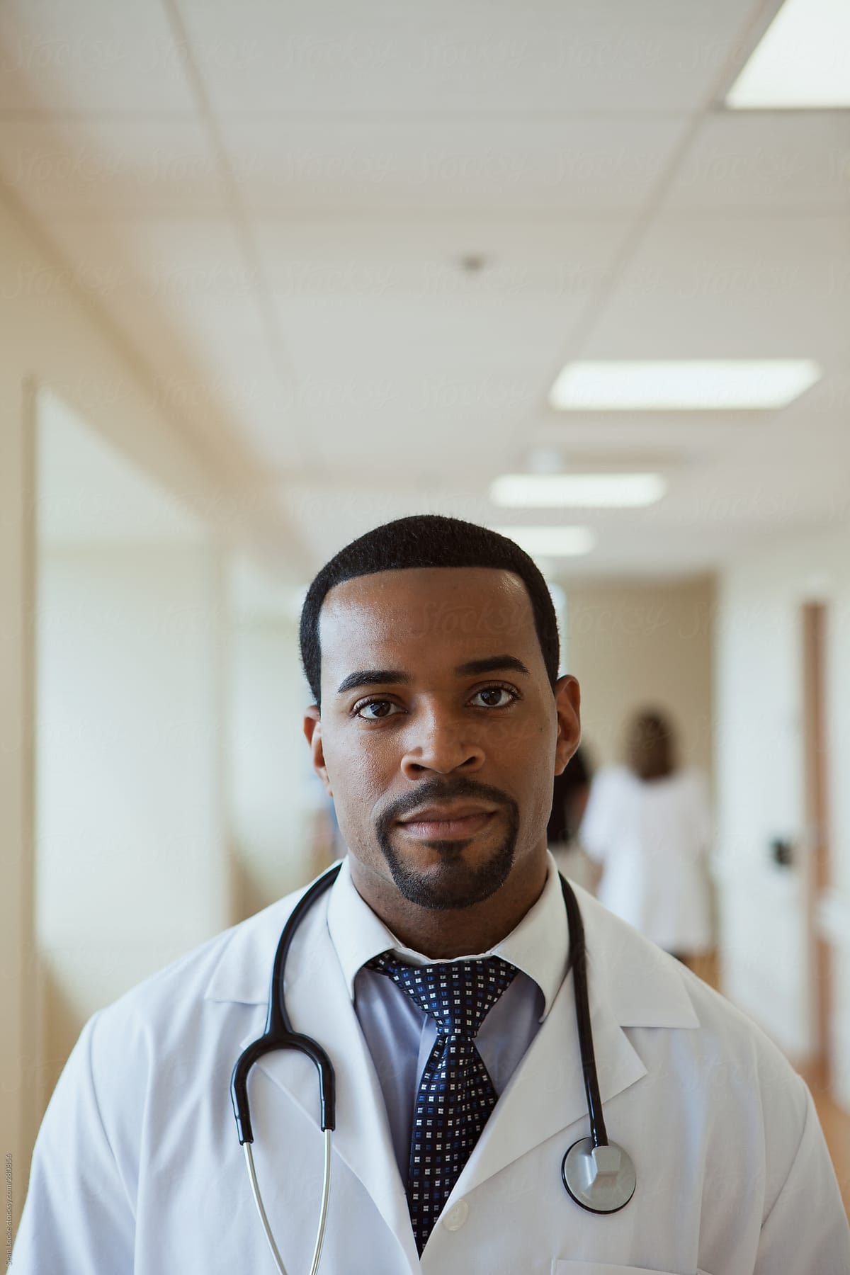 "Hospital: Confident Physician In Hospital Hallway" by Stocksy ...