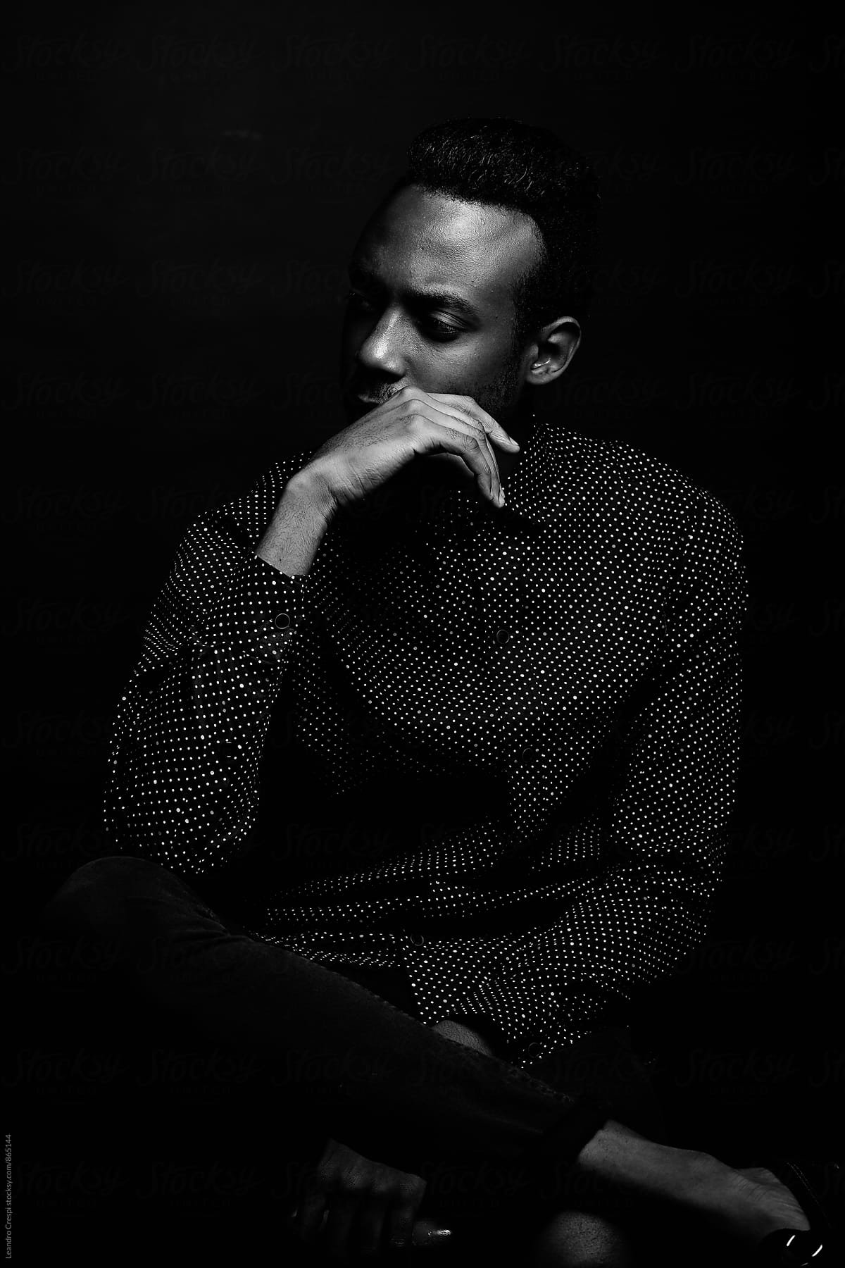 "Single Black Man" by Stocksy Contributor "Leandro Crespi" - Stocksy