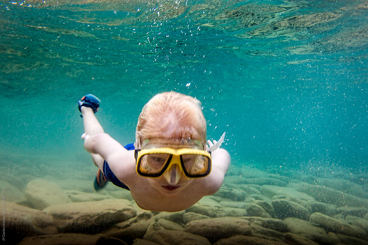 "Little Boy Diving Underwater At Summer Camp Lake" by Stocksy ...