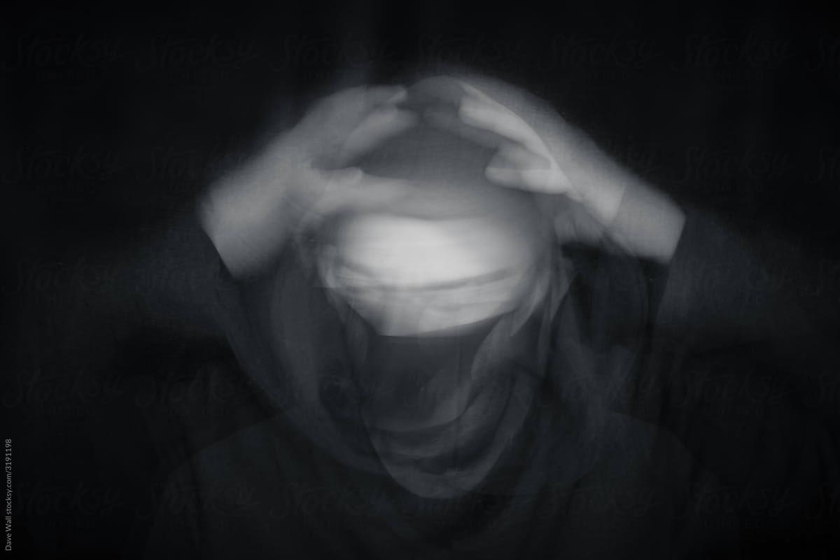 "A Double Exposure Of A Blurred, Hooded Man Wearing A Mask." by Stocksy ...