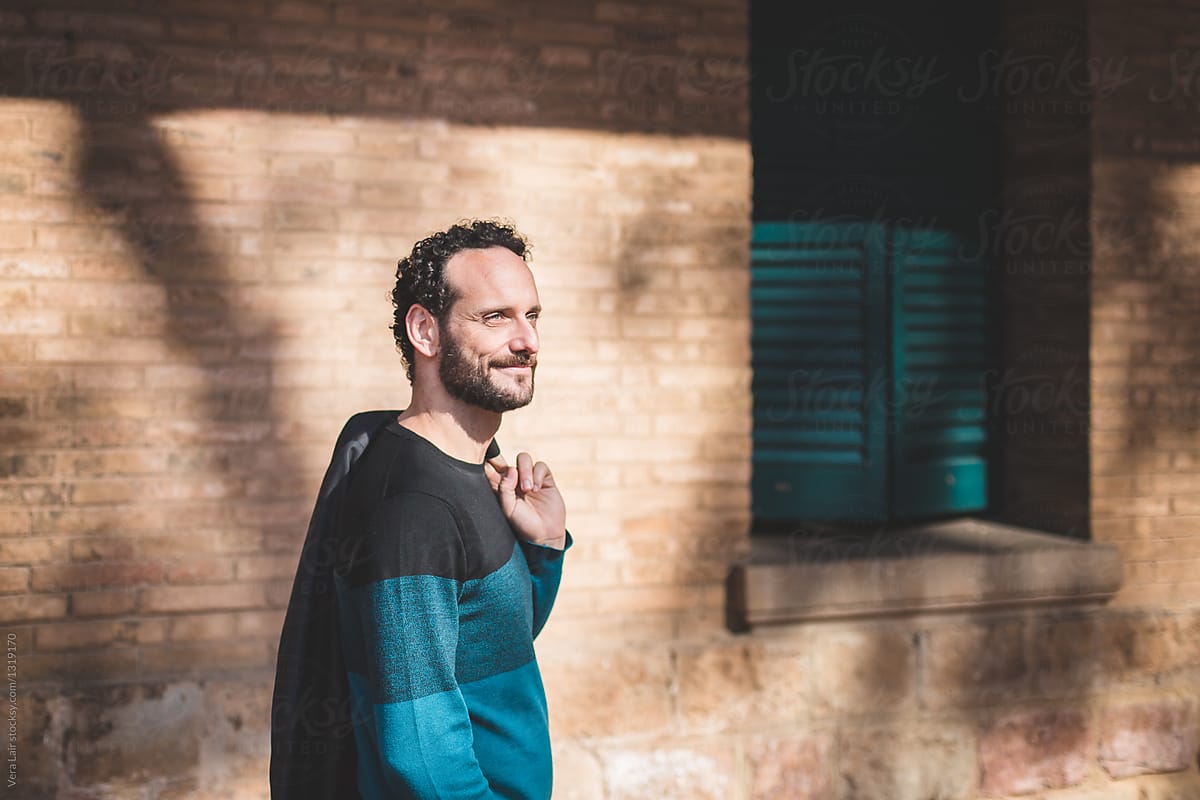"Portrait Of A Happy Man" by Stocksy Contributor "Vera Lair" - Stocksy