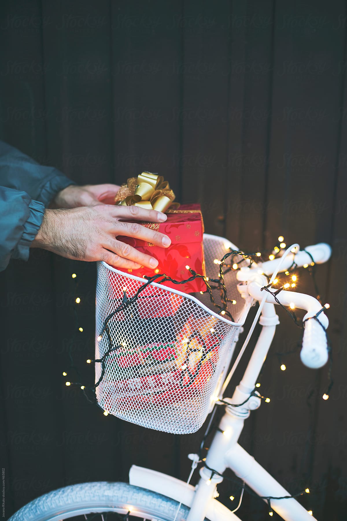 "Man Taking Gifts" by Stocksy Contributor "Jovana Rikalo" - Stocksy