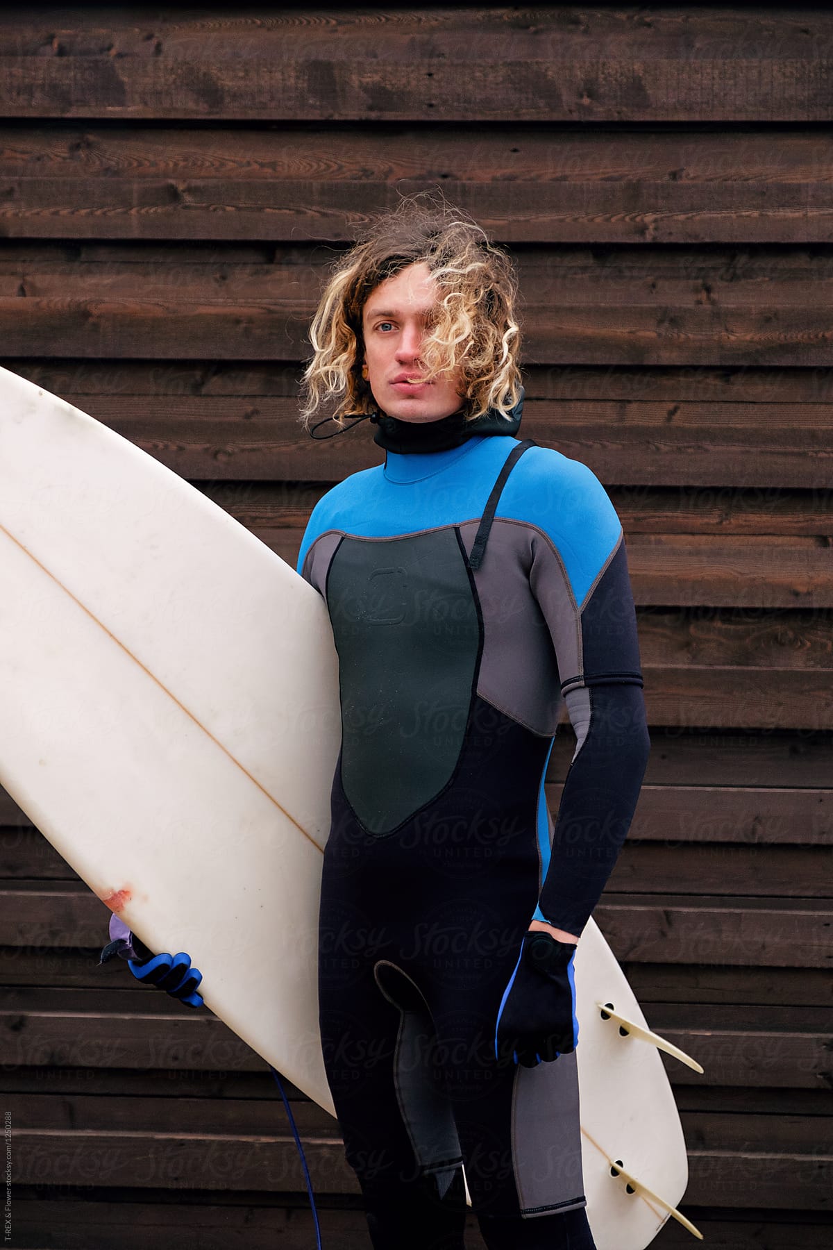 "Surfer Posing With Surfboard" by Stocksy Contributor "Danil Nevsky ...