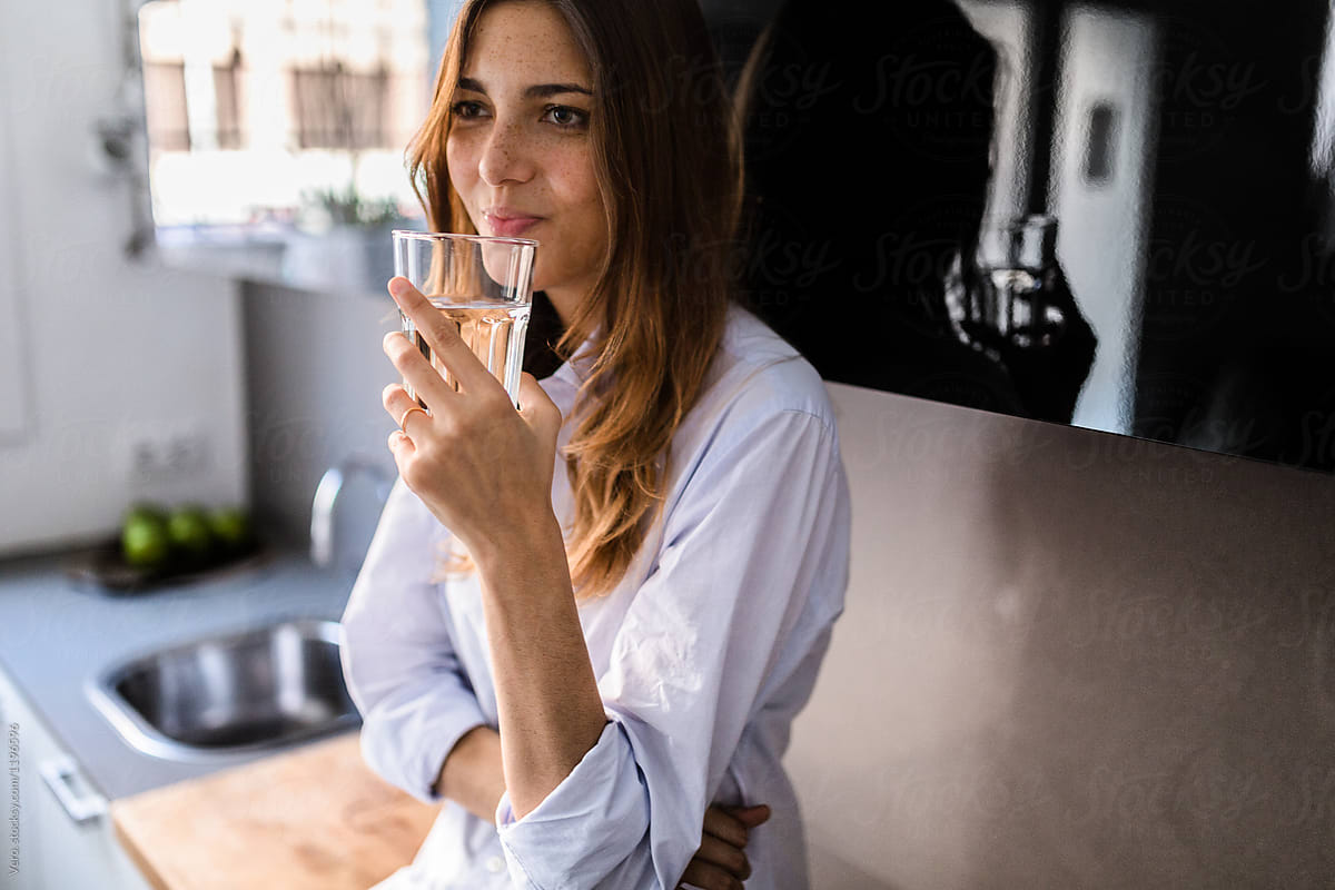 Woman Drinking Water Kitchen