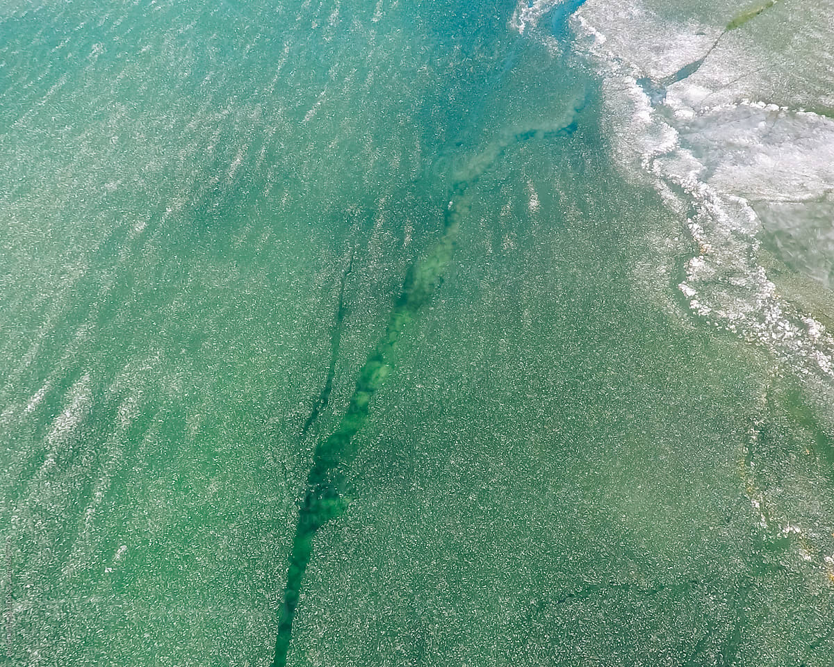 "Melting Lake In Spring" by Stocksy Contributor "Jen Grantham" - Stocksy