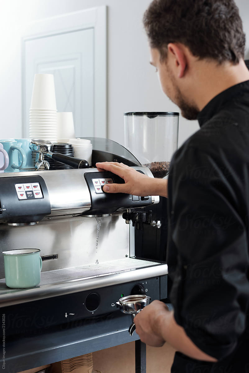 "Barista Making Espresso" by Stocksy Contributor "Clique Images" - Stocksy
