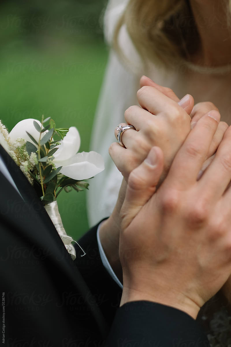 "Crop Of In Love Couple Holding Hands" by Stocksy Contributor "Adrian ...