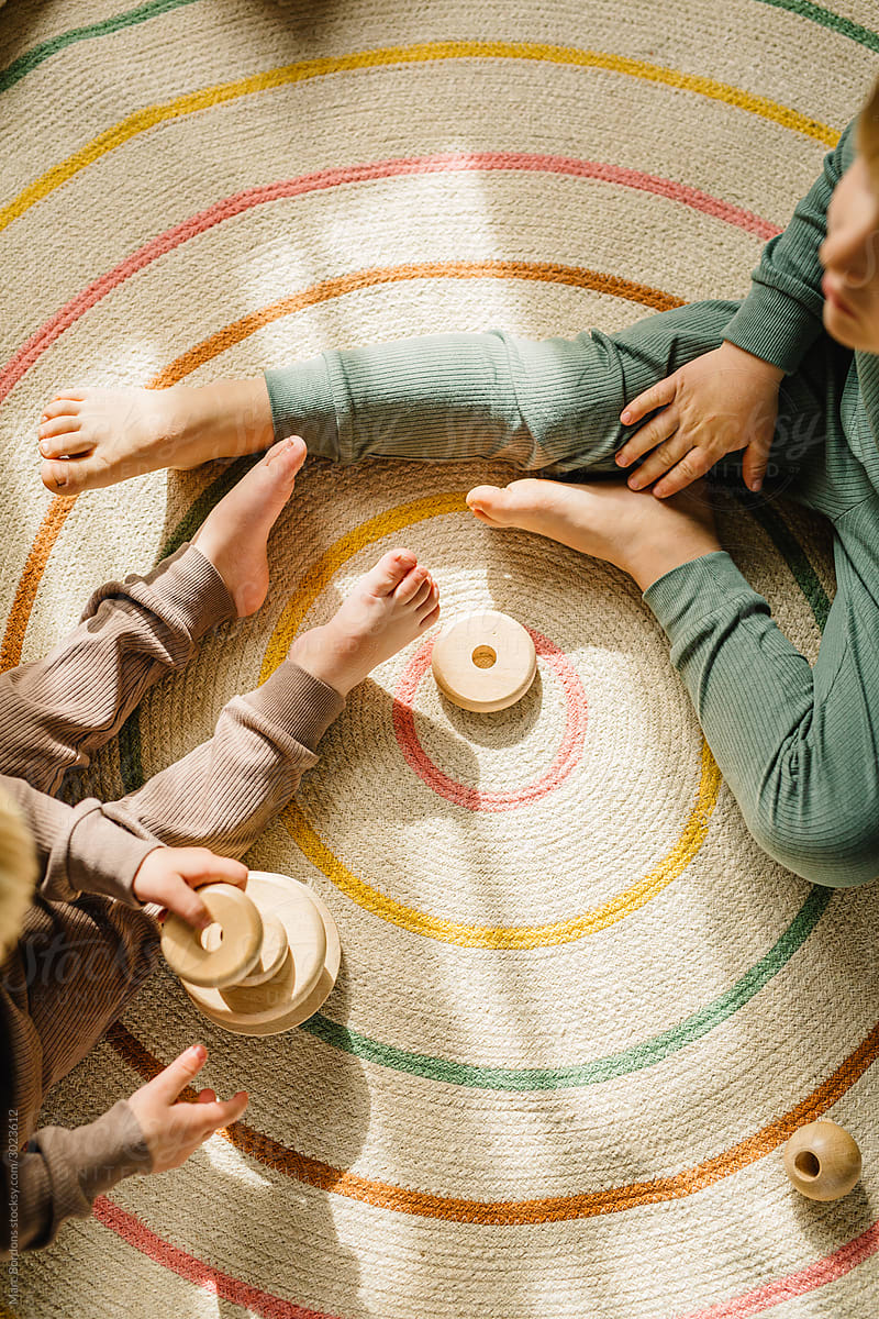 "Barefoot Kids" by Stocksy Contributor "Marc Bordons" - Stocksy