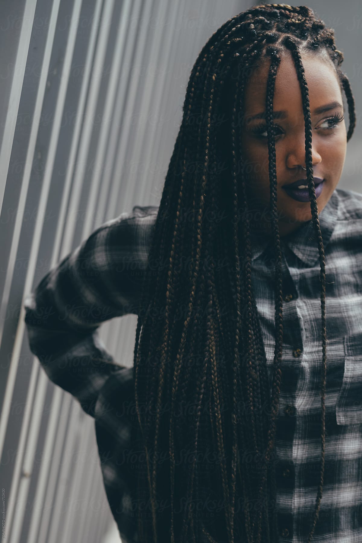 "Portrait Of A Woman With Braids" by Stocksy Contributor "ZOA PHOTO ...