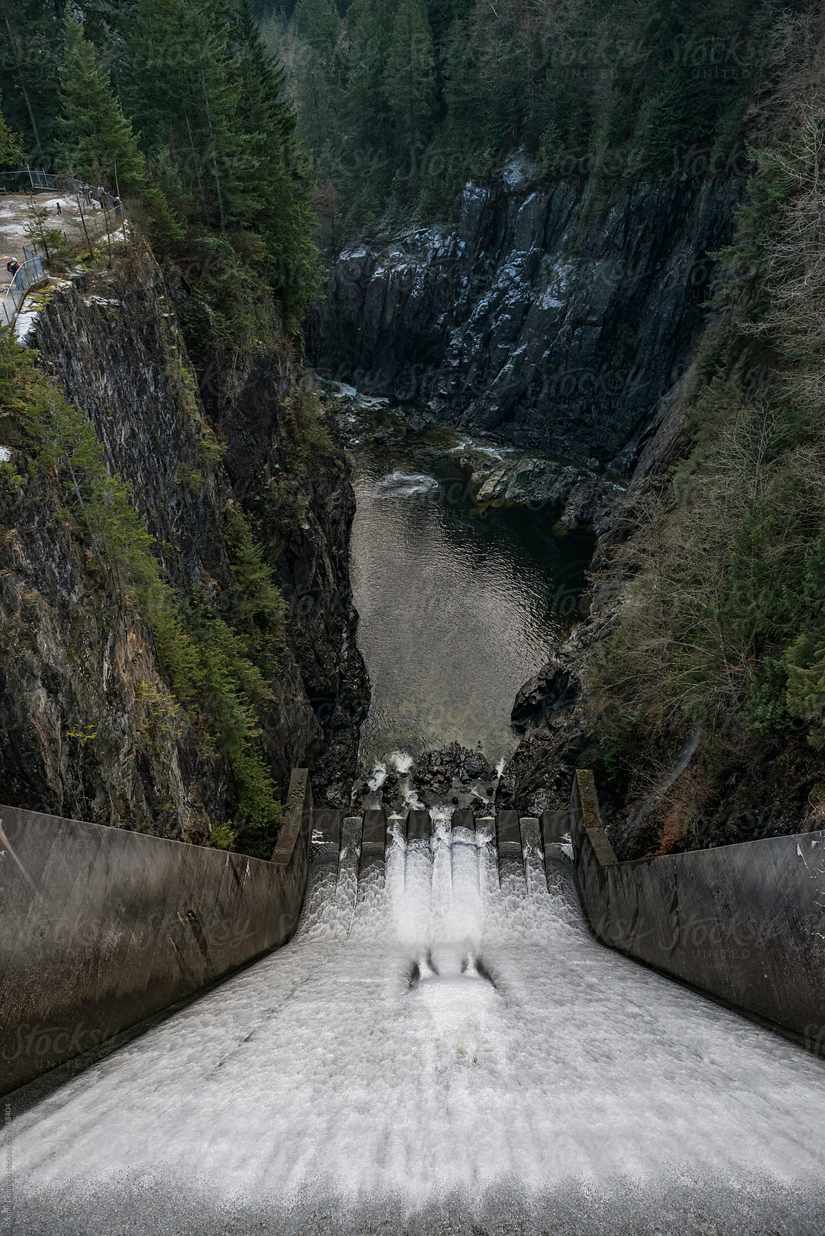 "Dam In Rugged Area" by Stocksy Contributor "Ronnie Comeau" - Stocksy