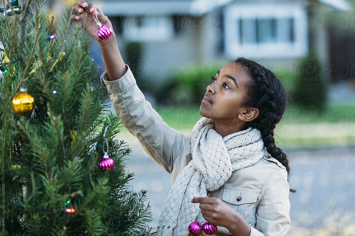 "African American Girl And Christmas Tree" by Stocksy Contributor ...