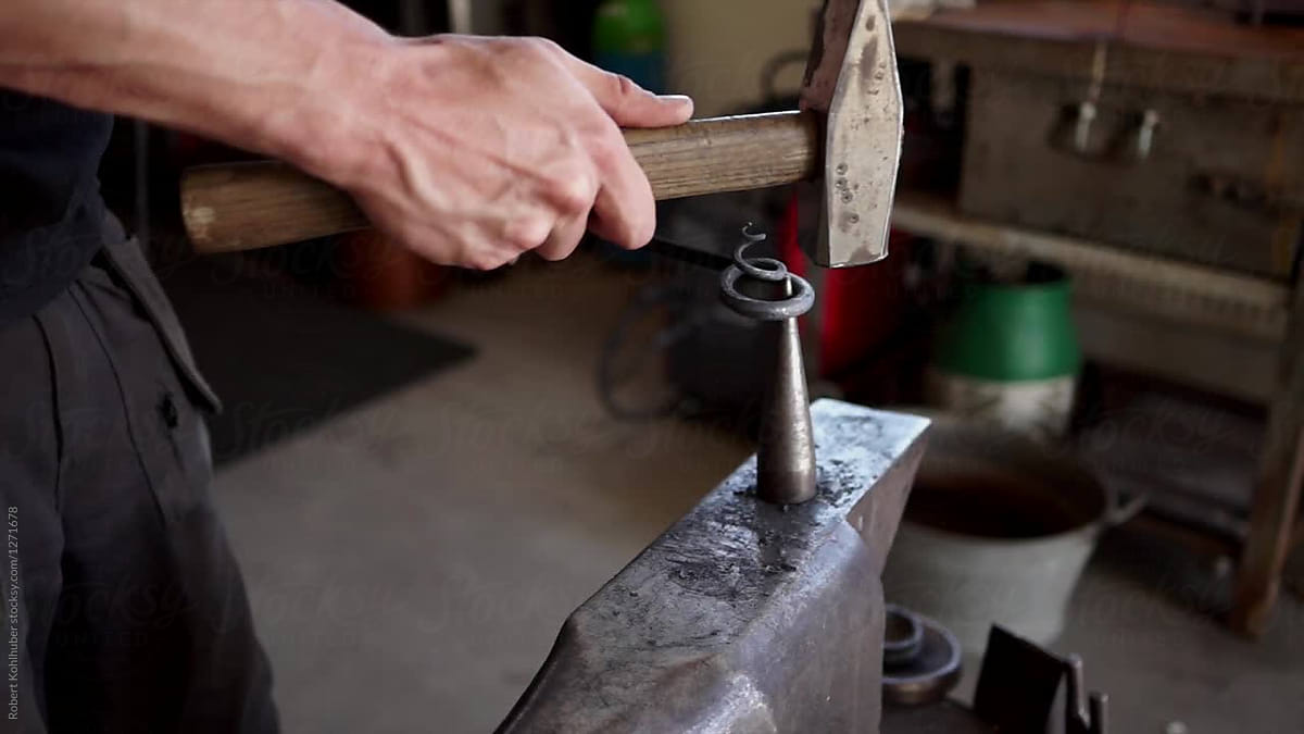 "Blacksmith Working In Workshop" by Stocksy Contributor "Robert ...