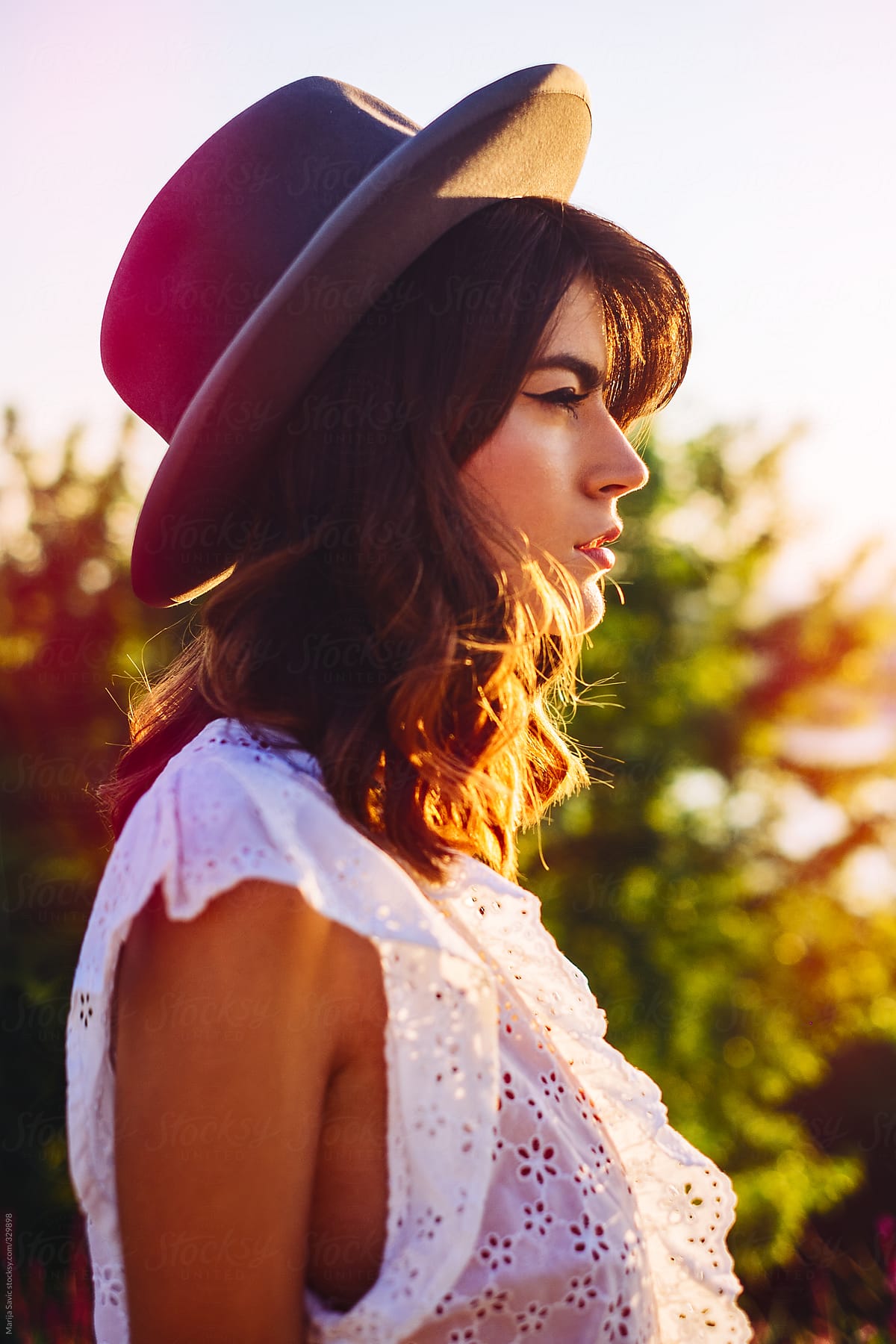 "Beautiful Woman During Sunset" by Stocksy Contributor "Maia Images ...