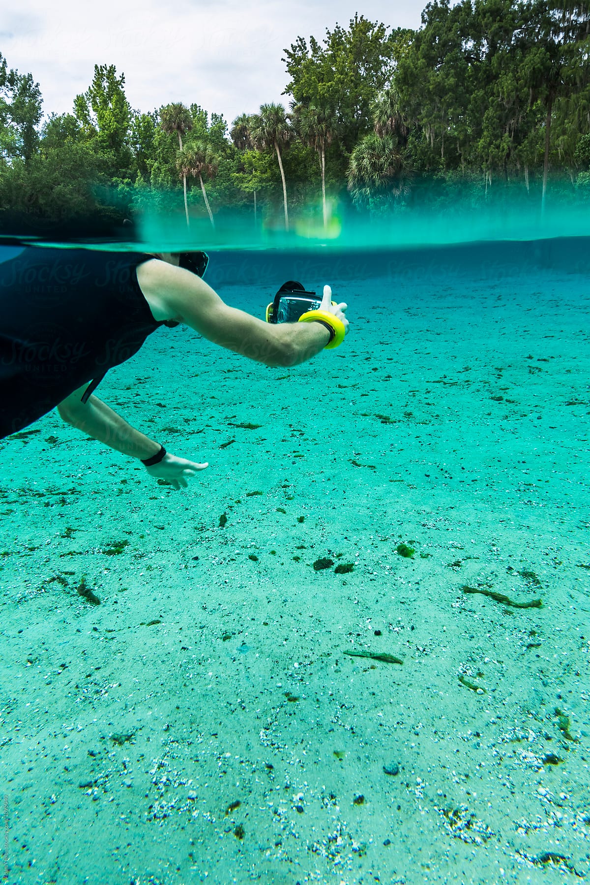 "A Snorkeler Using A Smartphone Camera Underwater" by Stocksy ...