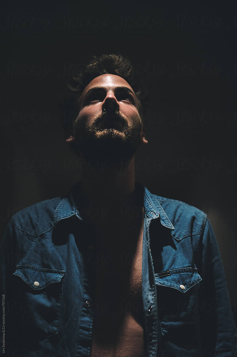 "Man Looking Up" by Stocksy Contributor "Urs Siedentop & Co" - Stocksy