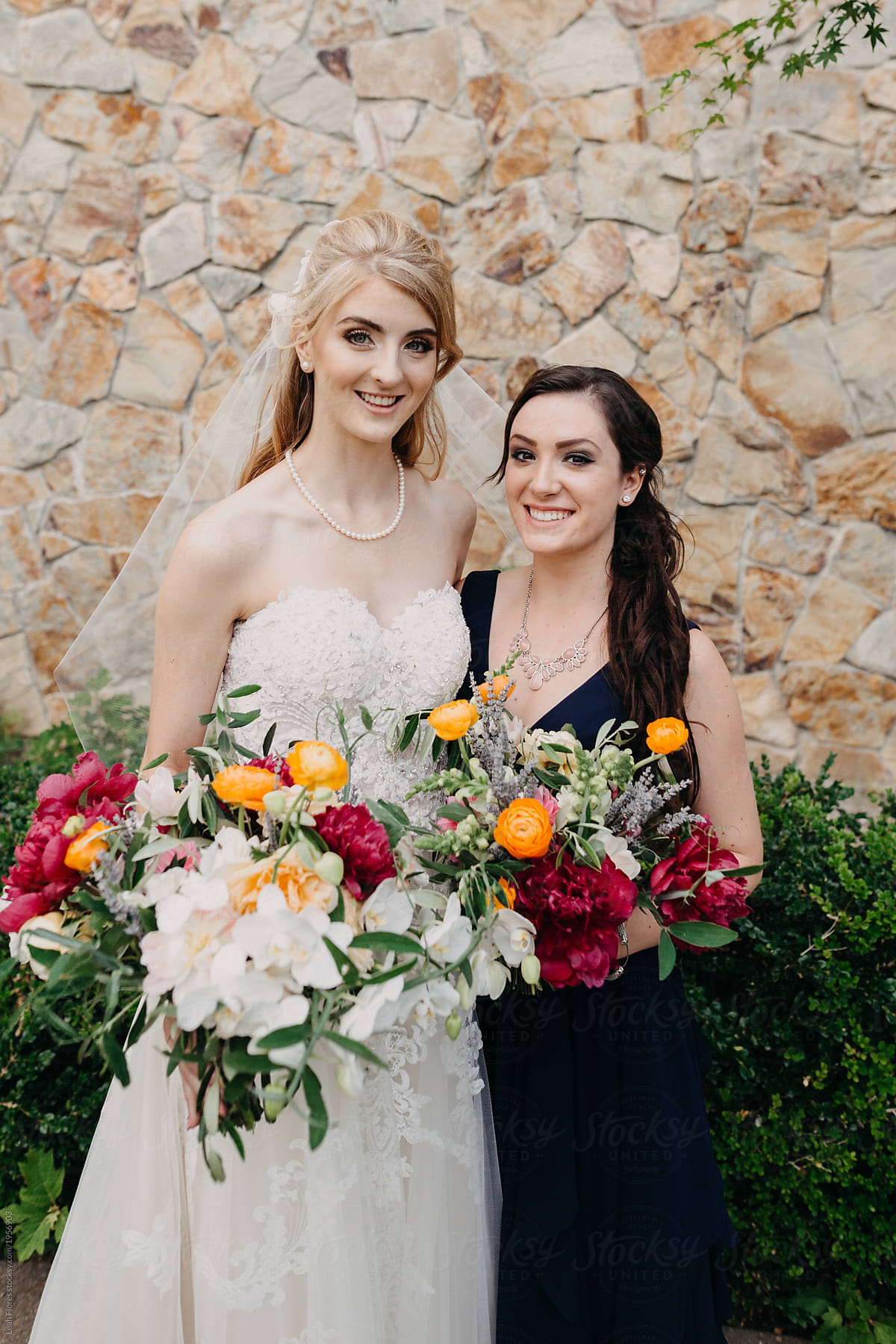 "Portrait Of Beautiful Bride And Bridesmaid" by Stocksy Contributor ...